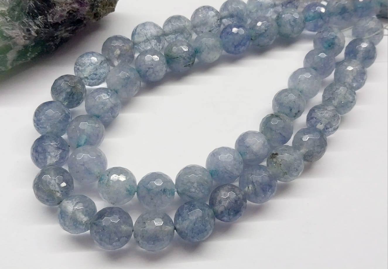 AGUAMARINA TRASLUCIDO | FACETADA | 12MM – CrystalStone