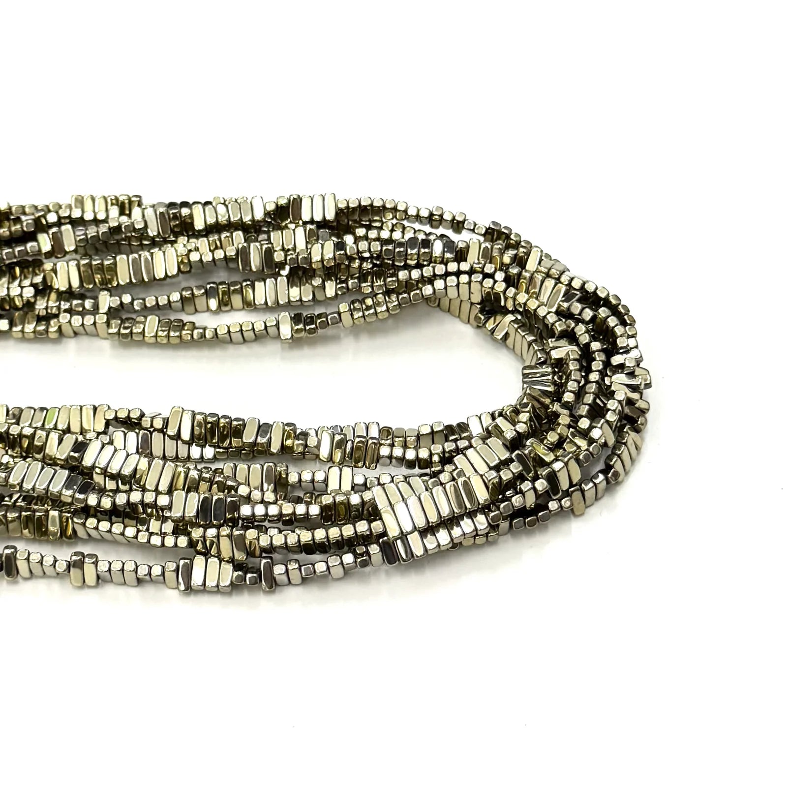 HEMATITA | RECTANGULO | 6.2MM X 2MM | DORADO CLARO – CrystalStone